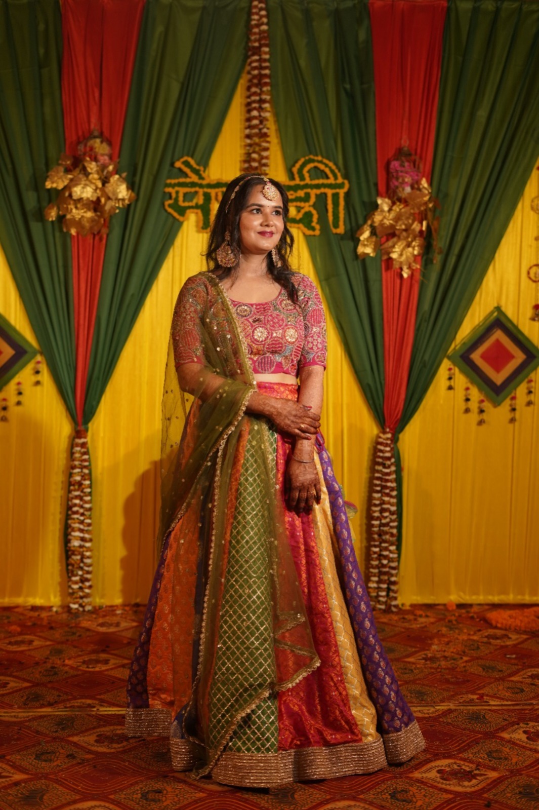 Multi coloured lehenga set with Rani multi blouse and mehendi net ...